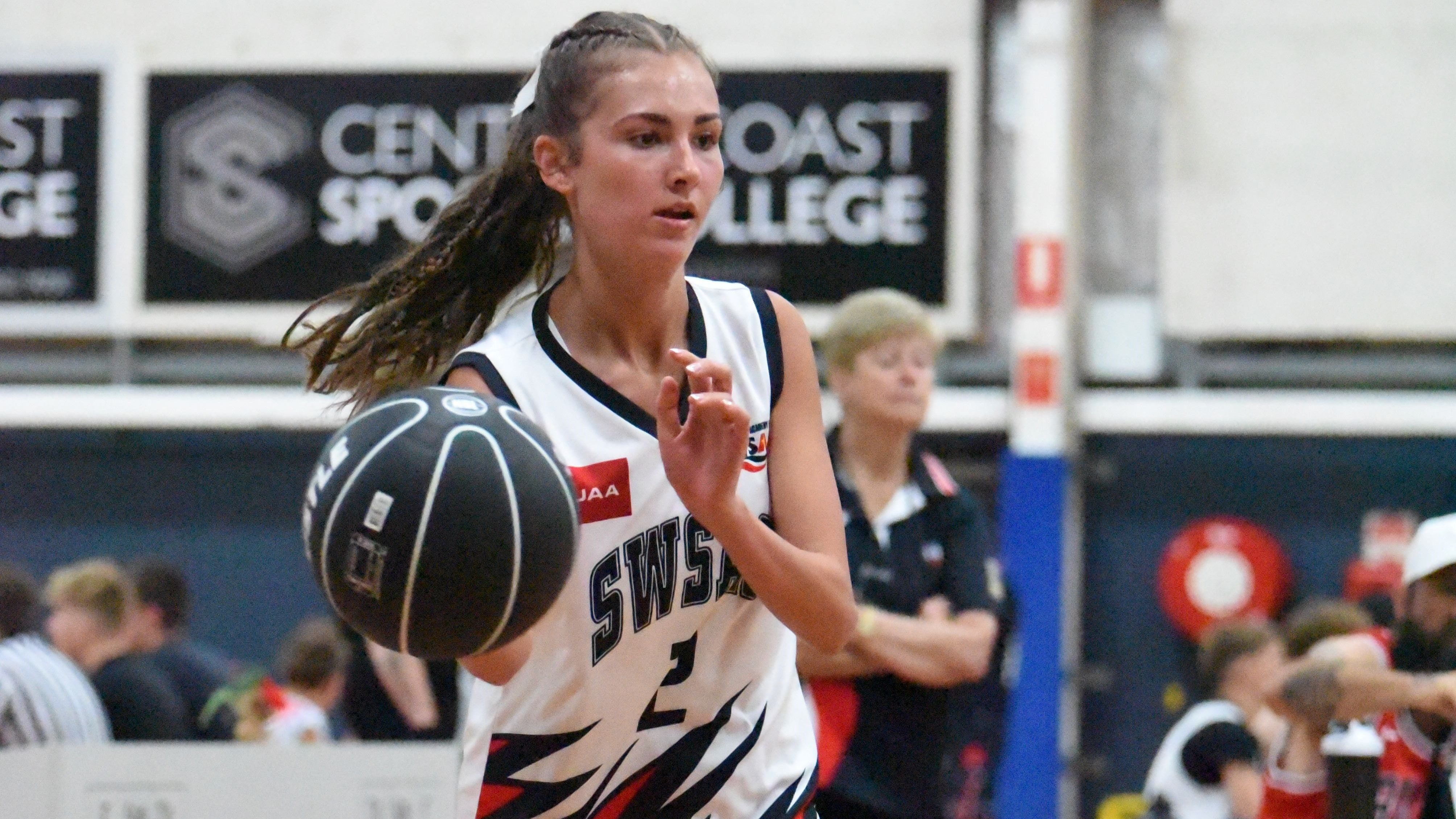 She Hoops To Shine On and Off the Court